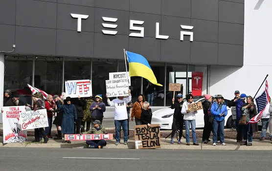 Man Drives Car Into Protesters Outside A Tesla Dealership, Nobody Hurt ...